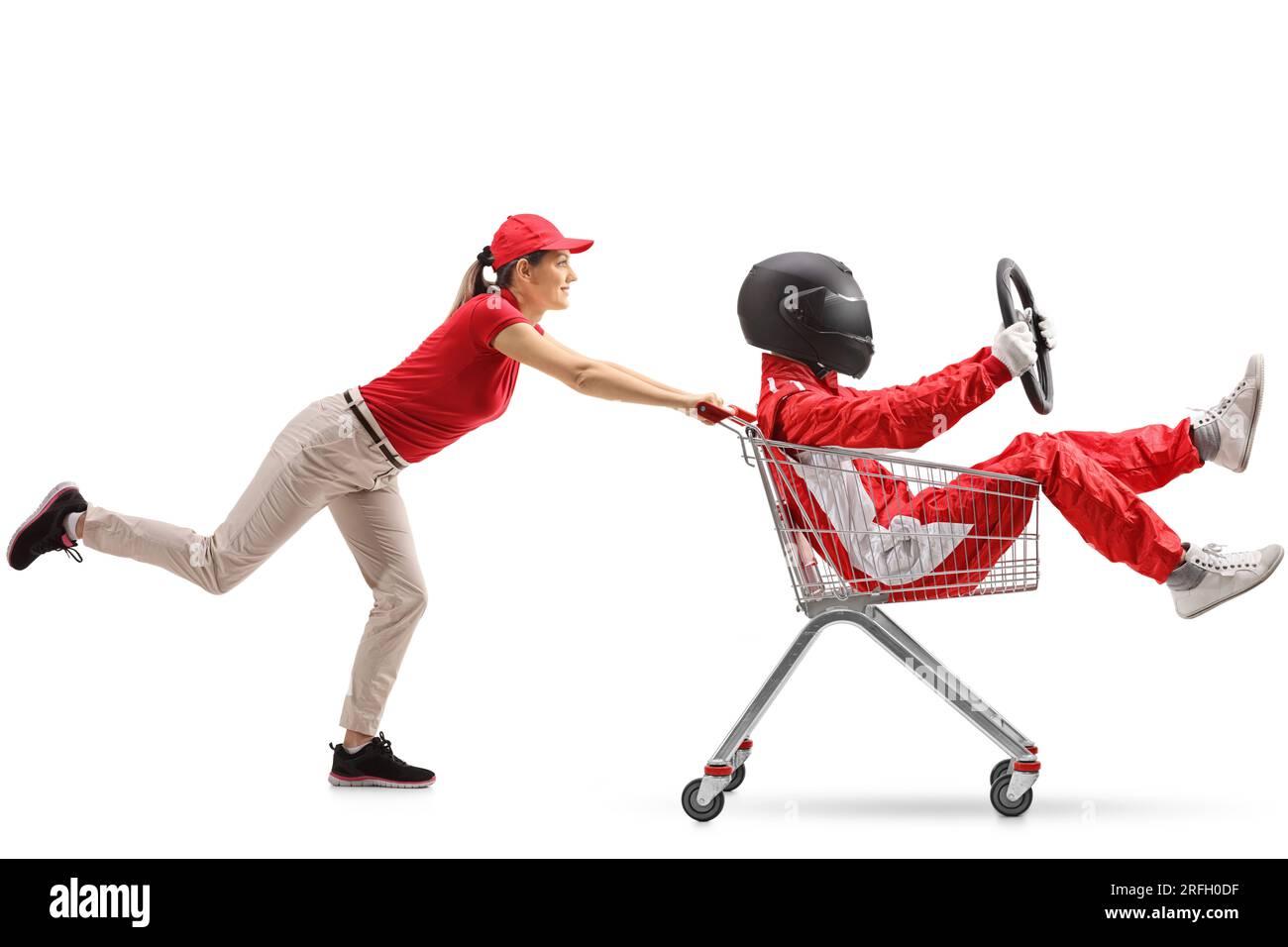 Shop assistant pushing a cart with a racer inside isolated on white ...