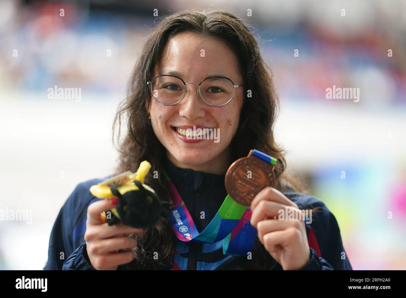 Great Britain's Alice Tai celebrates winning bronze in the Women's 100m ...