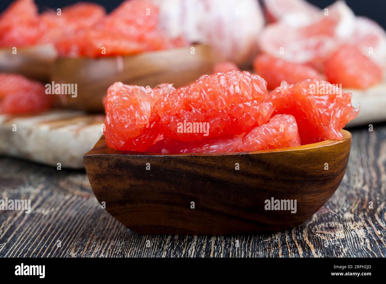 sour ripe grapefruit peeled and divided into slices, pink grapefruit ...