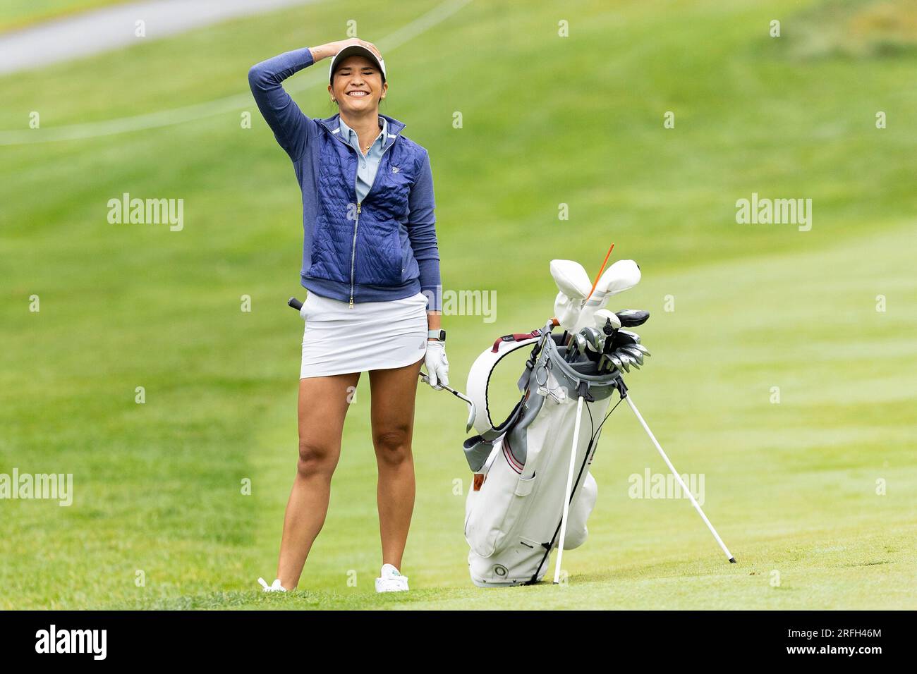 LIV Golf Broadcast member, Su-Ann Heng reacts on the 10th hole during ...