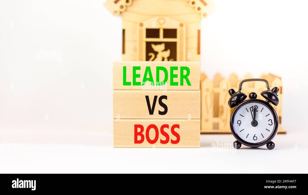 Boss vs leader symbol. Concept words Boss vs versus leader on wooden ...
