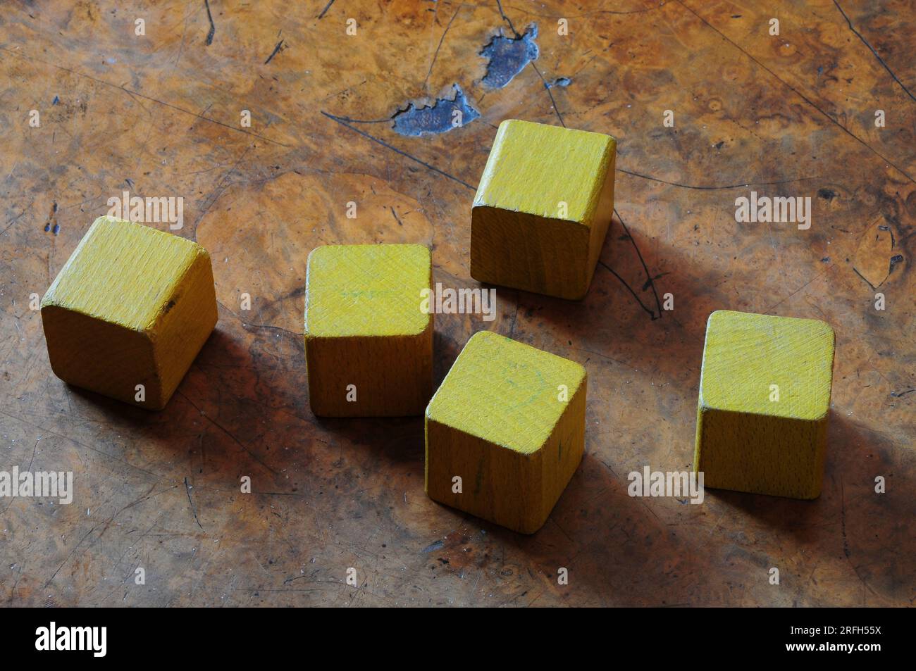Child's toy wooden yellow building bricks or blocks Stock Photo - Alamy
