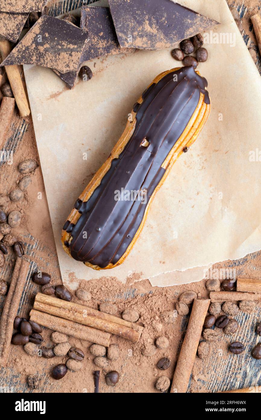chocolate covered custard eclair with creamy chocolate cream, custard ...