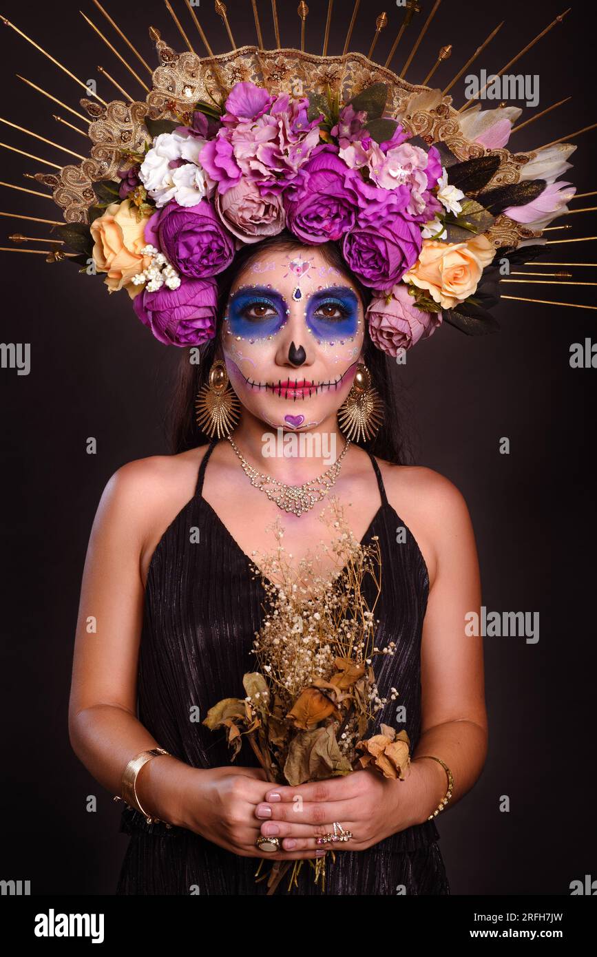 Studio portrait of a girl with catrina makeup. Day of the dead and ...