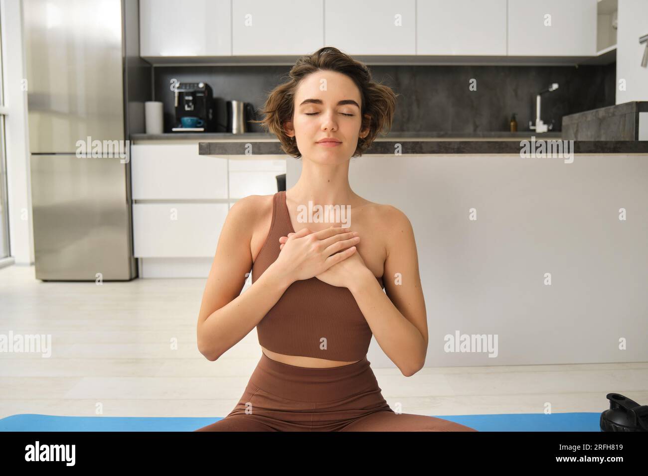 Heart chakra yoga. Portrait of woman practice mindfulness meditation at ...