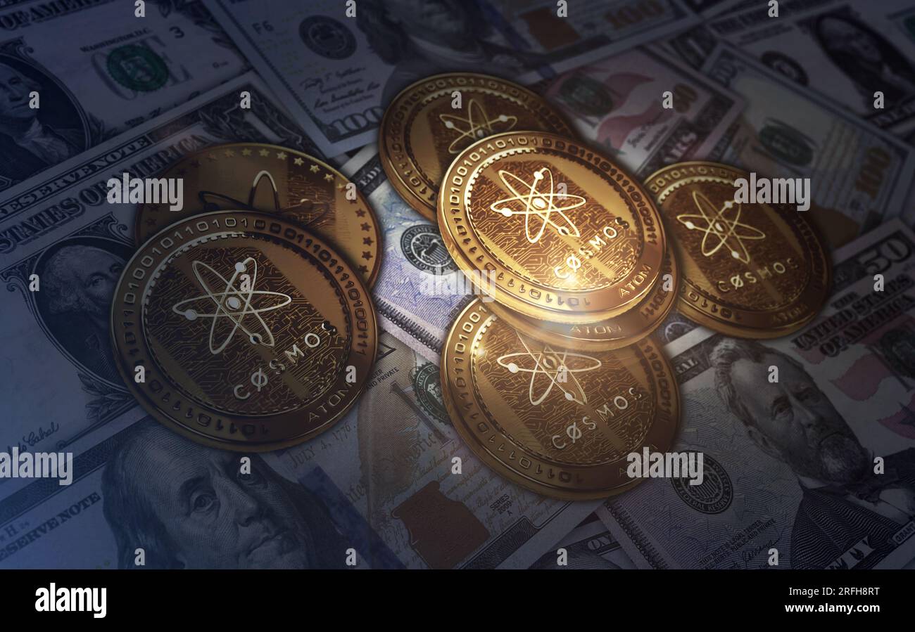 Cosmos ATOM cryptocurrency golden coin over Dollar banknotes. Online ...