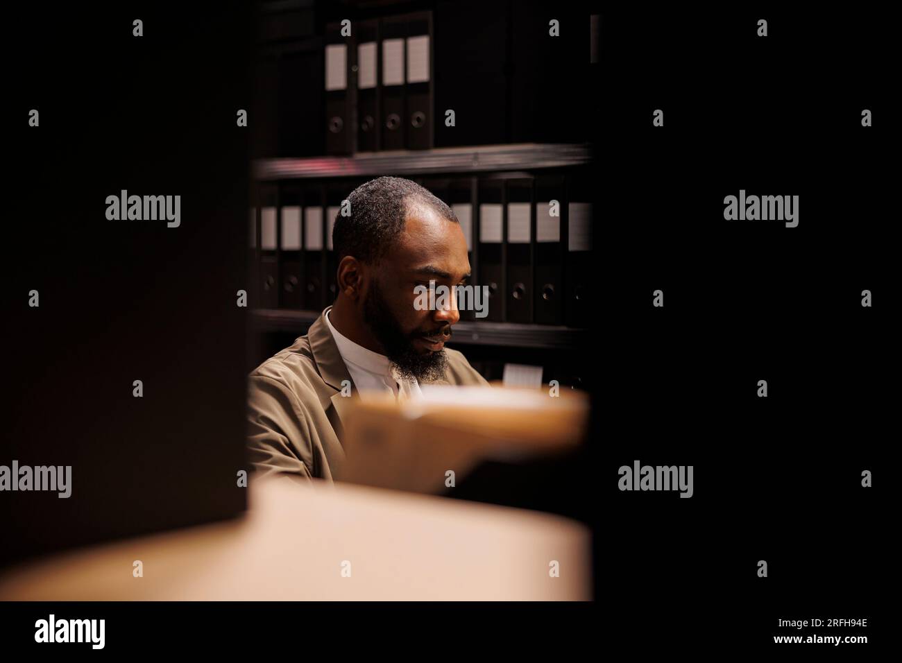 Private detective searching information in police records and working ...