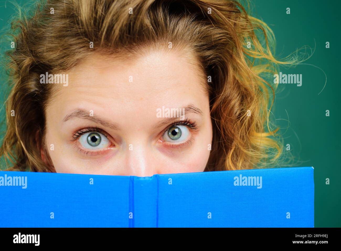 Closeup portrait of female teacher with class journal. School job ...