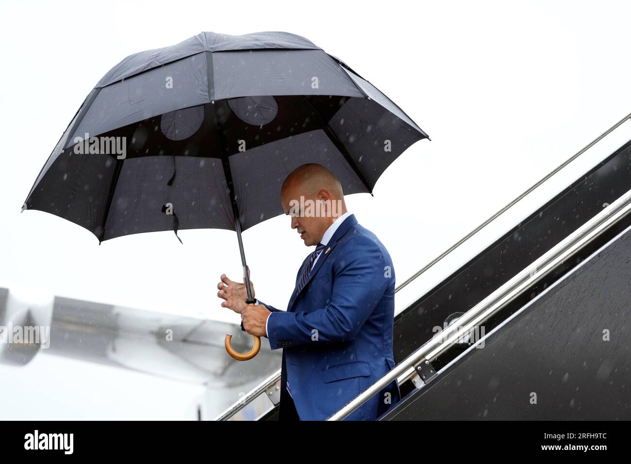 Former President Donald Trump's valet Walt Nauta walks to hand Trump ...