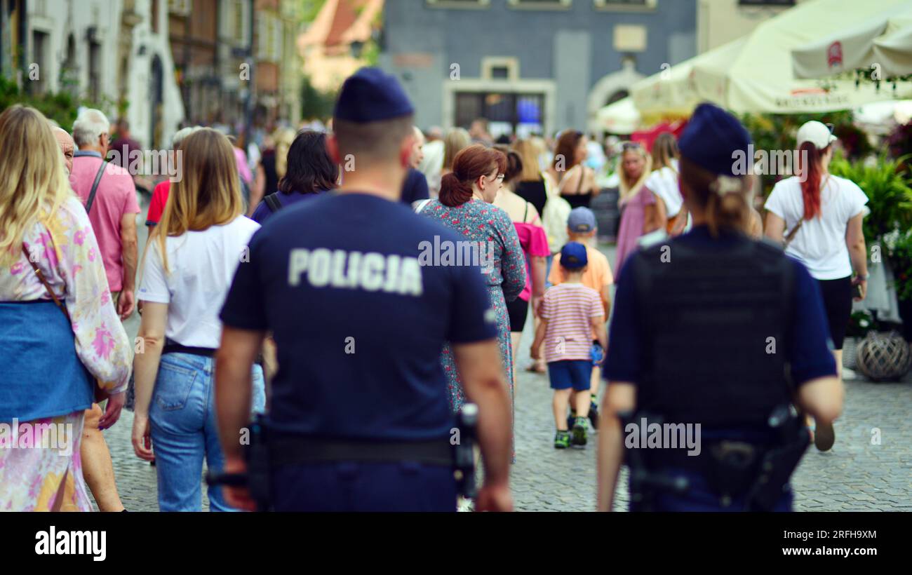 Police officer uniform on duty crowd walking hi-res stock photography ...