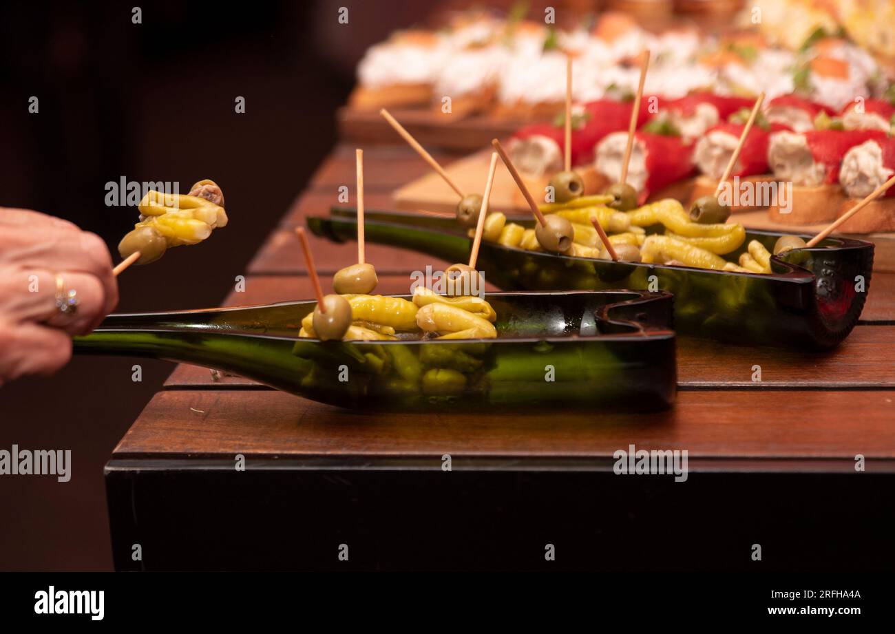 traditional basque appetizer of chili pepper, olive and anchovy Stock ...