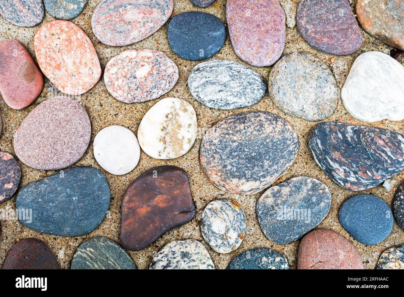close-up background of cemented pebbles as a decorative element in the ...
