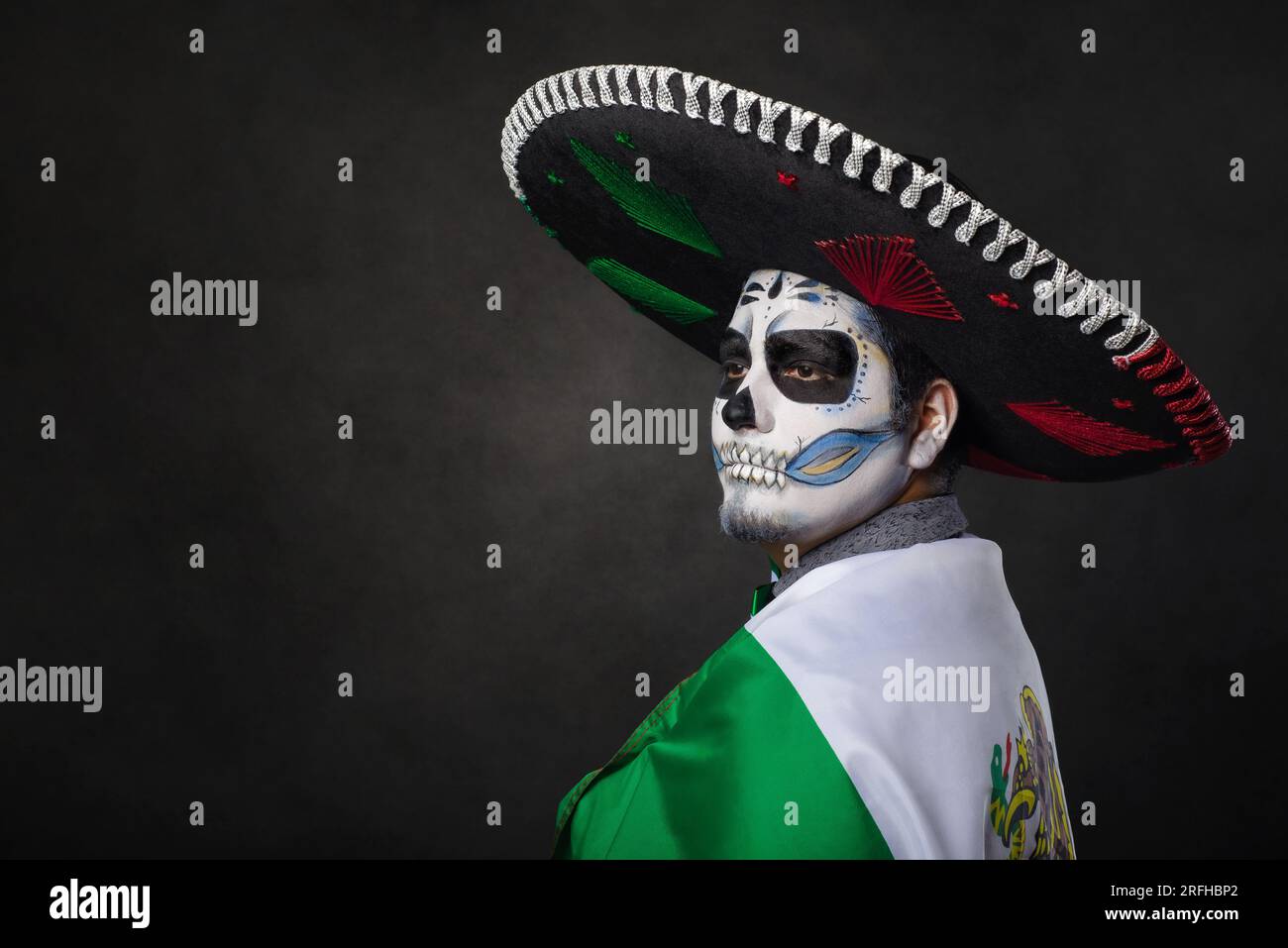 Portrait of catrin wearing charro hat and showing mexican flag. Day of ...