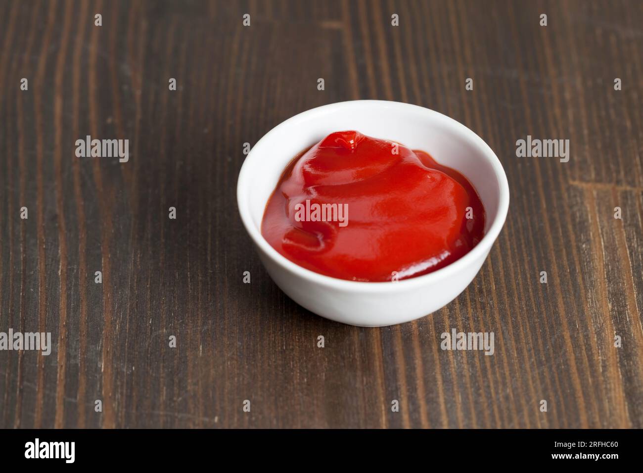 tomato red ketchup poured into a red plate, red ketchup from natural ...