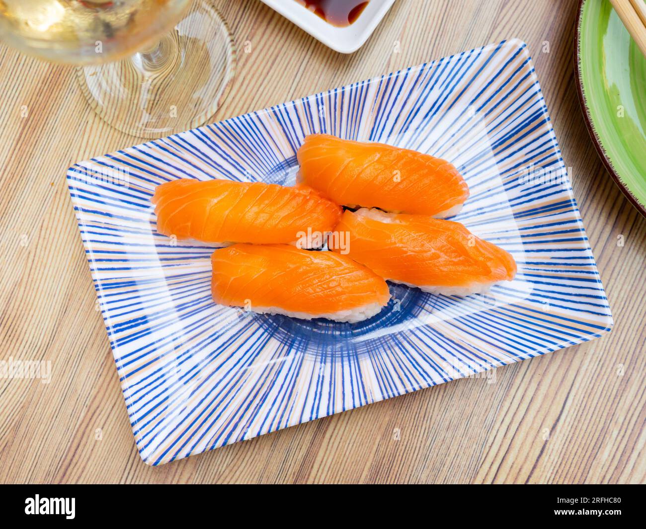 row salmon nigiri Stock Photo - Alamy
