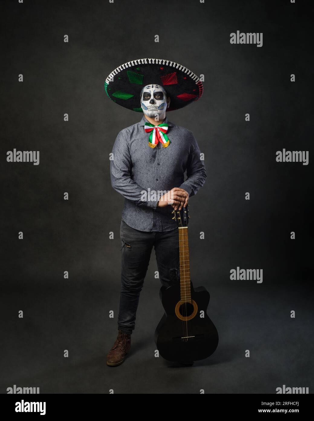 Portrait of catrin with mariachi hat and guitar. Day of the dead ...