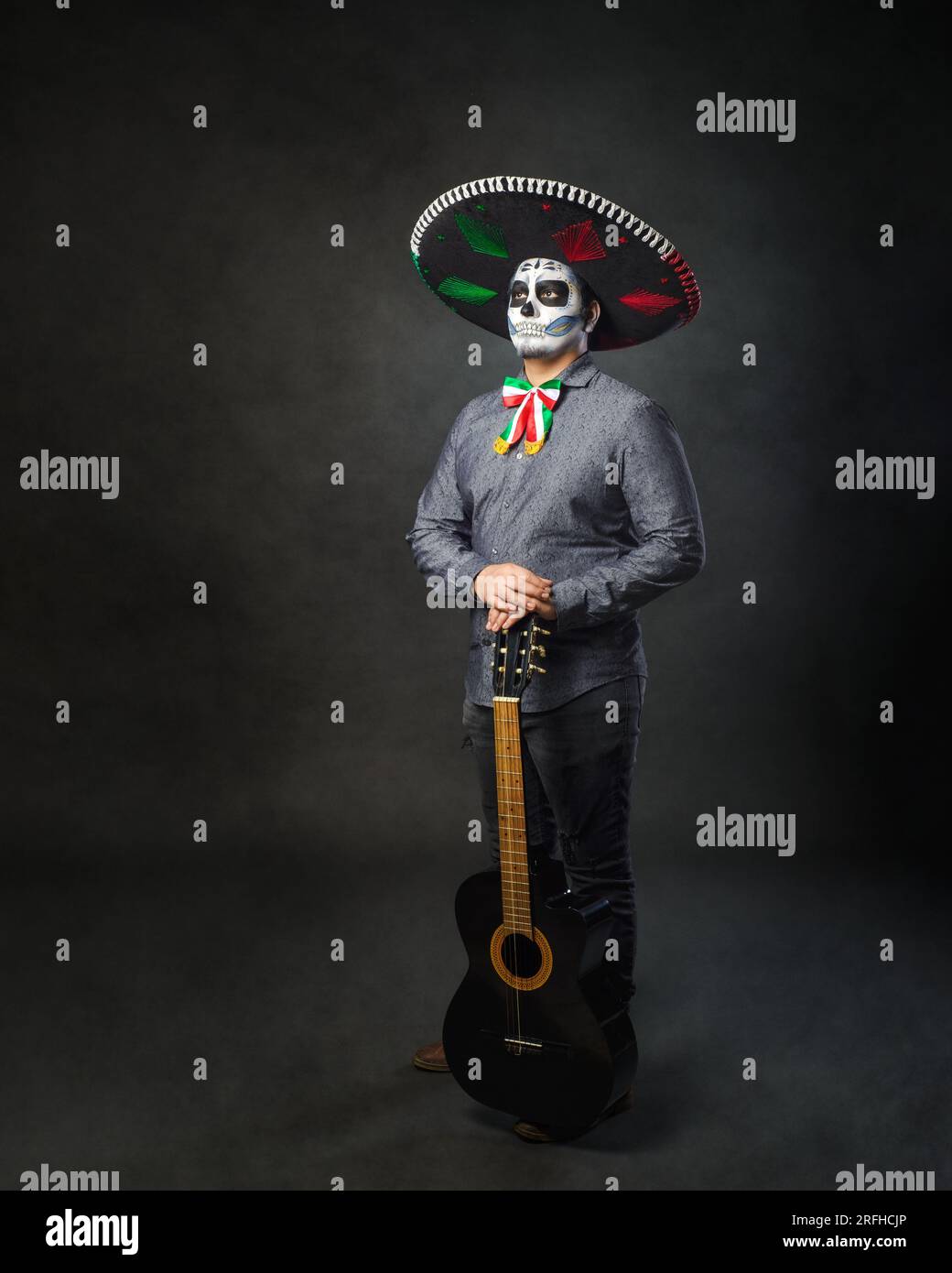 Portrait of catrin with mariachi hat and guitar. Day of the dead ...