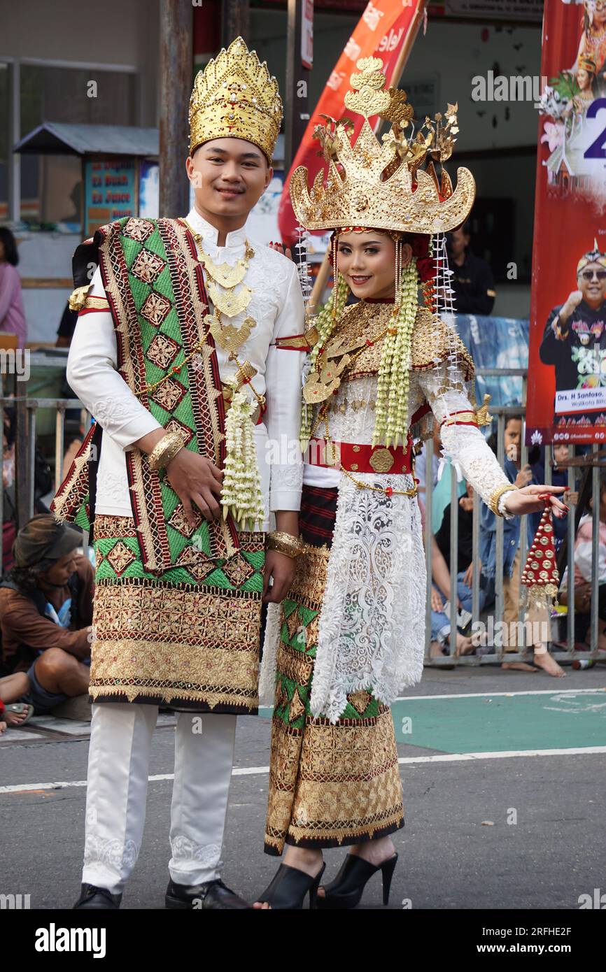 A couple with a traditional costume from lampung. This costume is ...