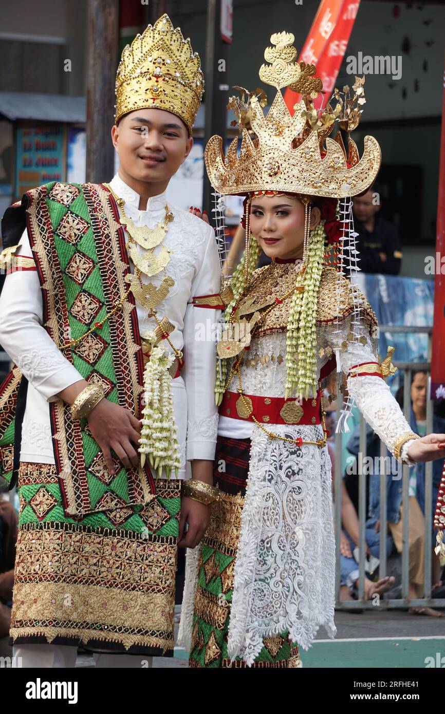 A couple with a traditional costume from lampung. This costume is ...