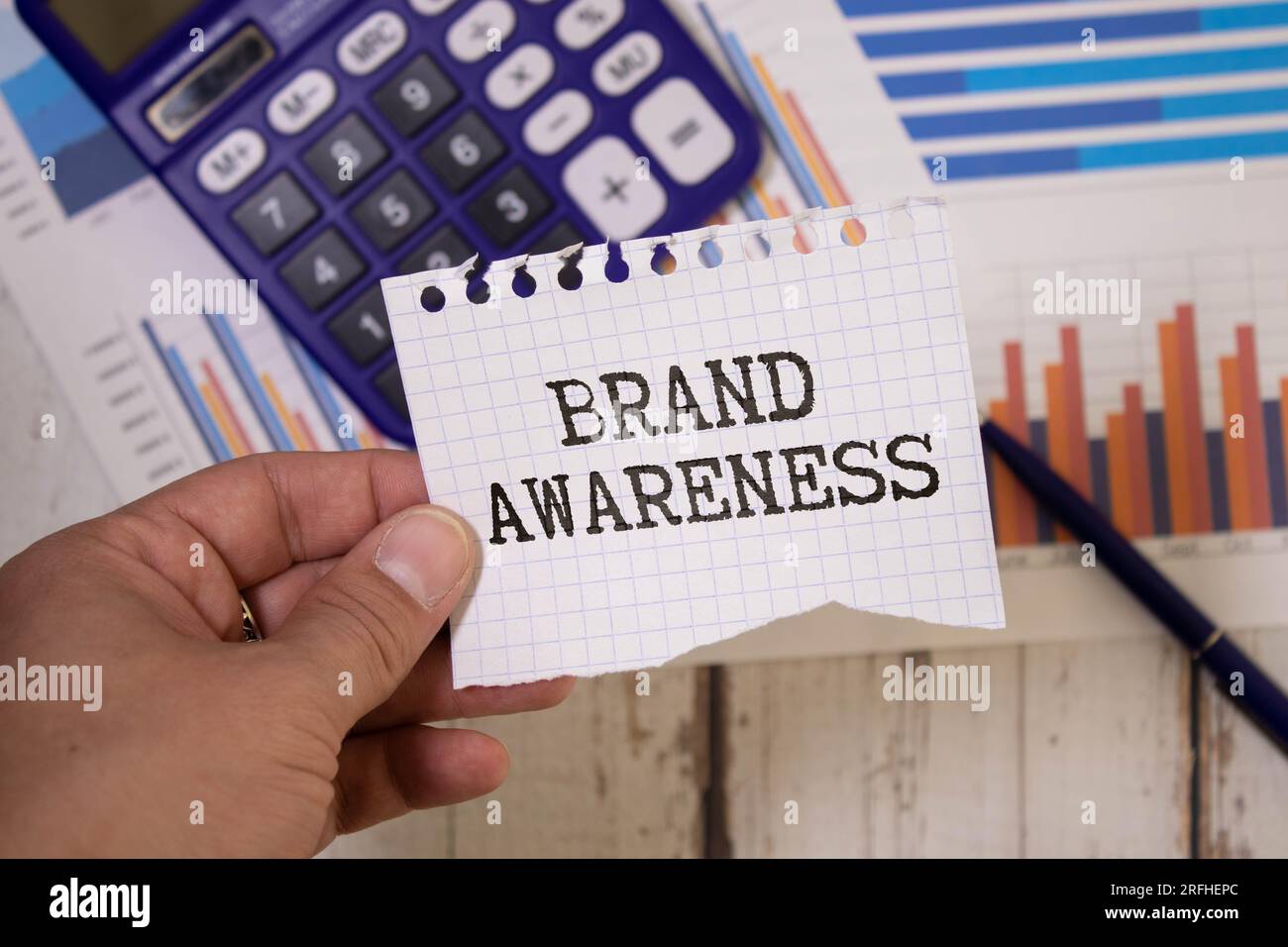 Brand awareness written on paper clipboard isolated on white background ...
