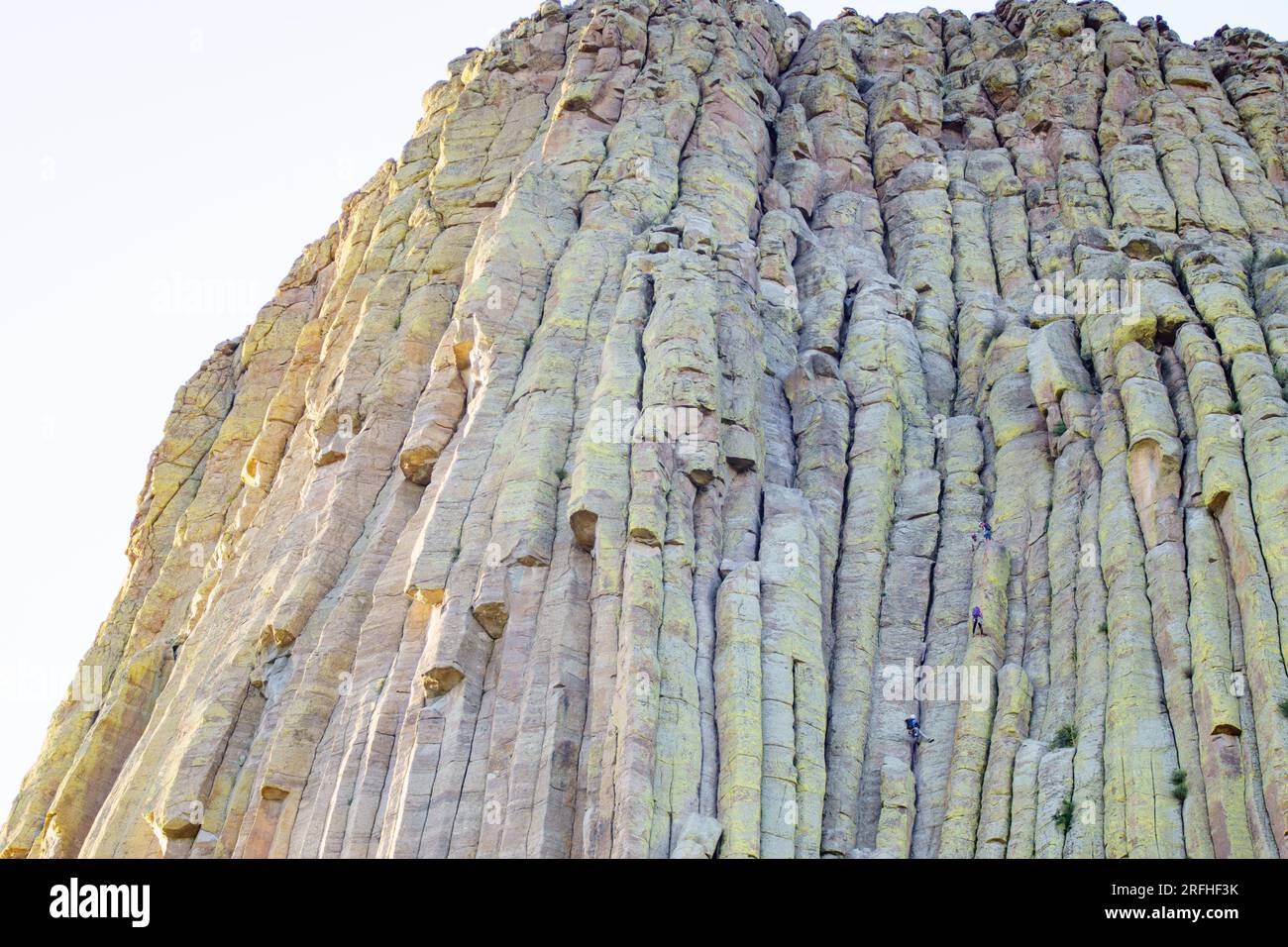 Climbing team scaling Devil's Tower National Monument, Wyoming, Black ...