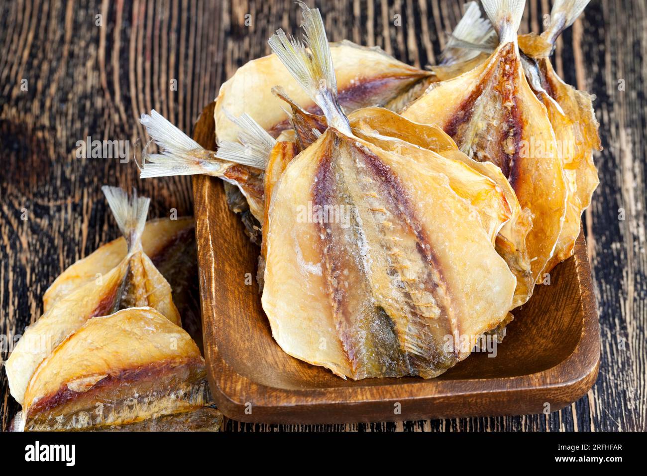 group of small fish gutted and dried with salt, dried and butchered ...