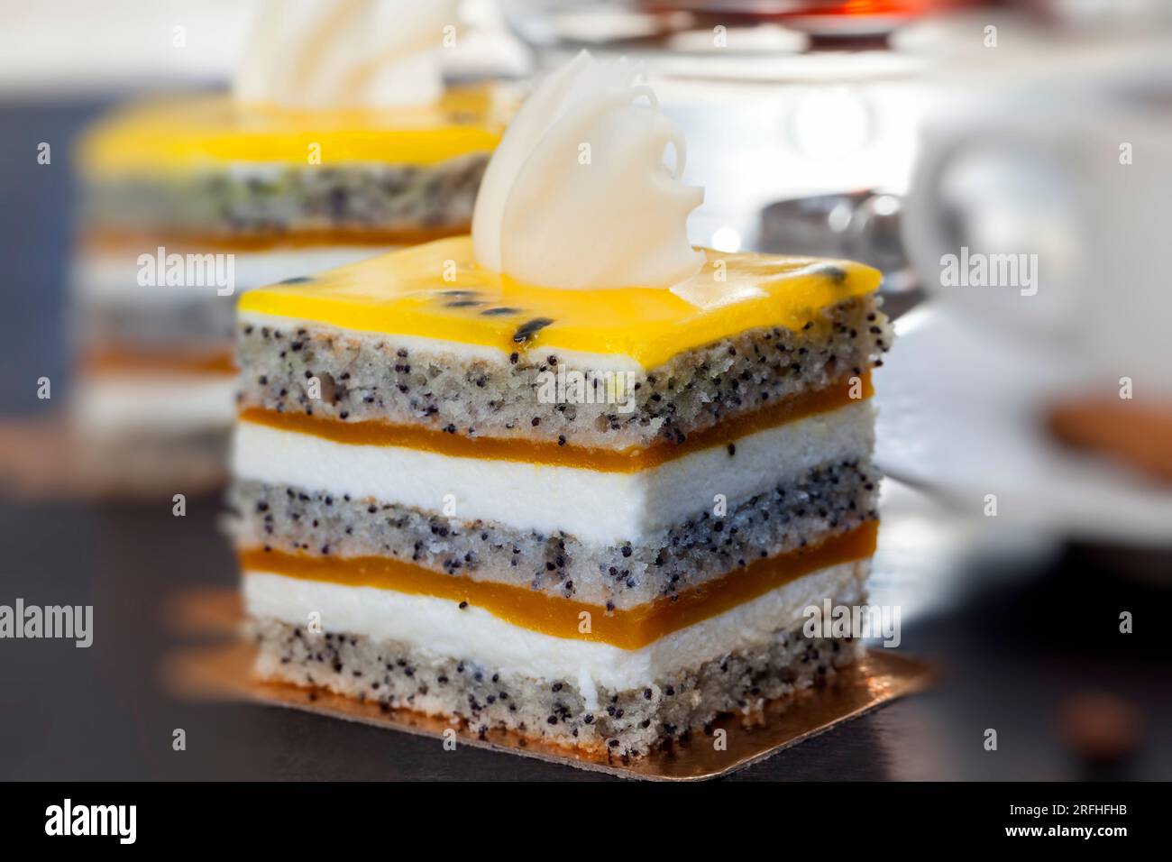 puff pastry made of poppy seed cakes, buttercream and a layer of mango ...