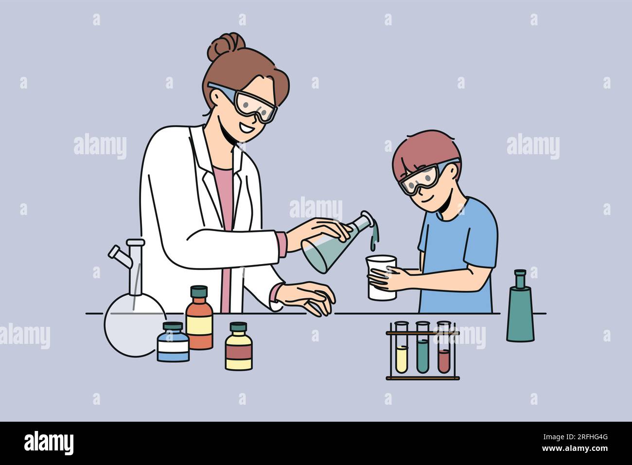 Woman teacher of chemistry teaches boy to conduct laboratory ...