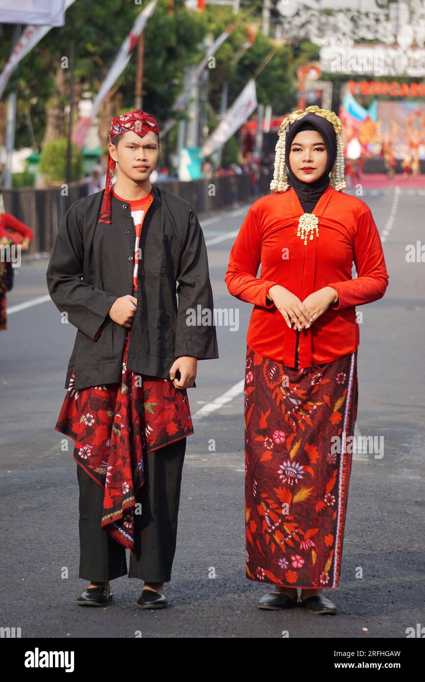 A couple with a traditional costume from madura called pesa`an Stock ...
