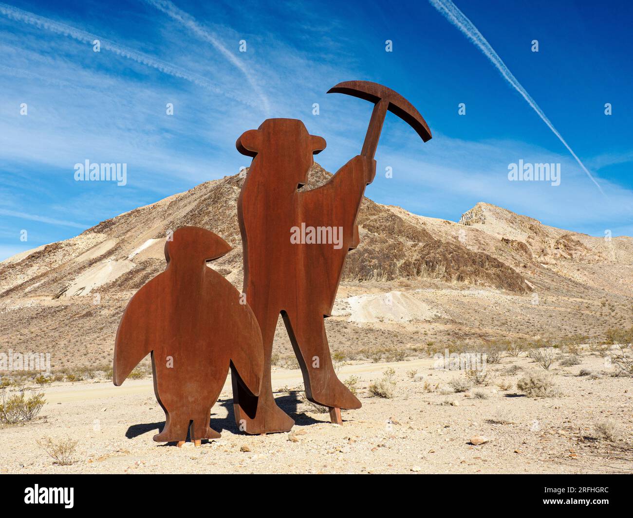 Metal statue in Rhyolite, a ghost town in Nye County, near Death Valley ...