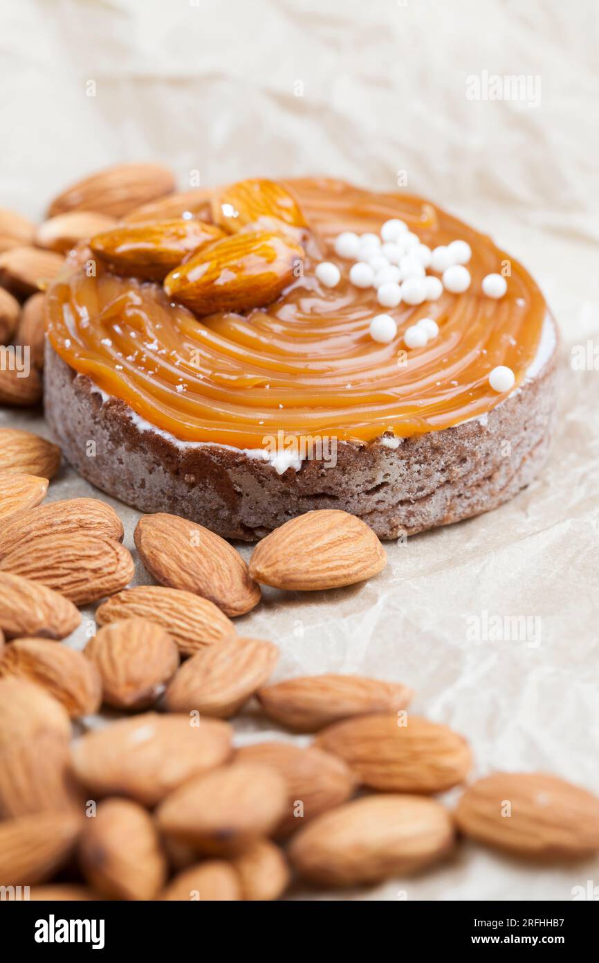 dessert made of dough and dairy products in caramel, round tartlet with ...