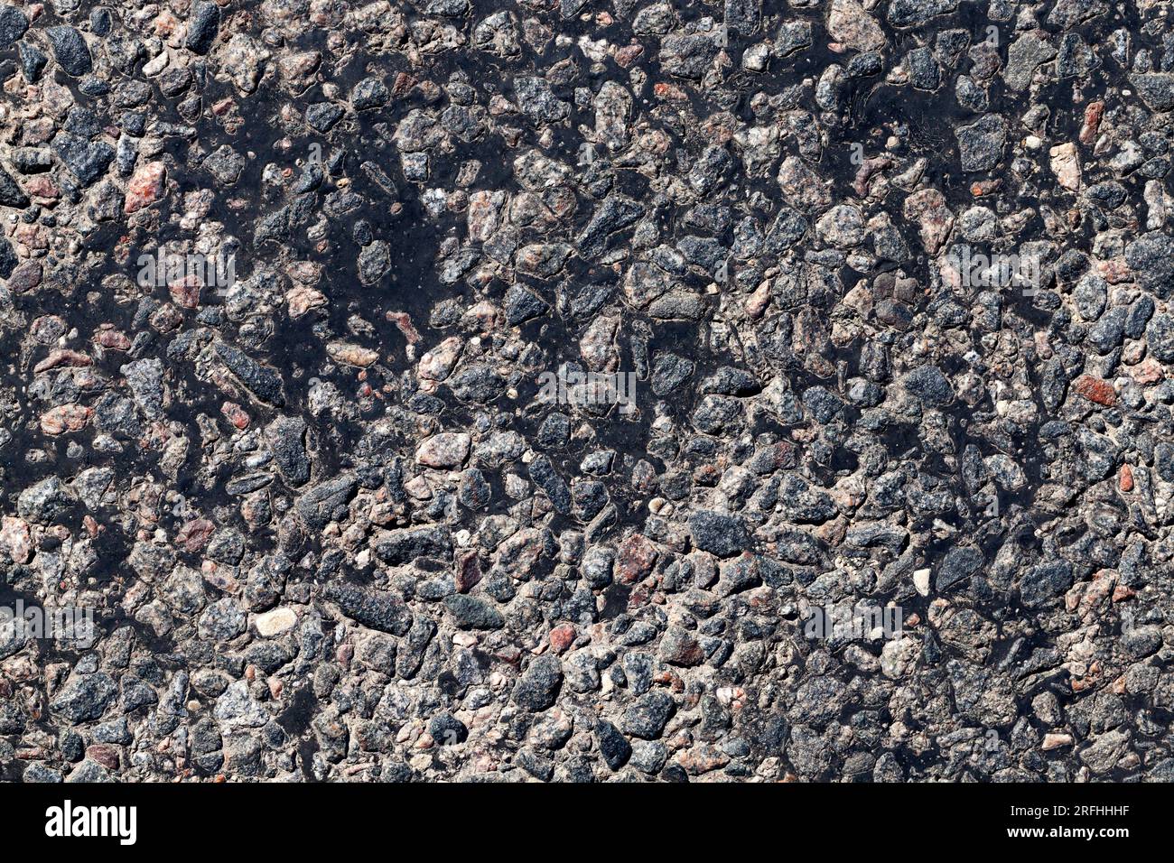 paved road, a close up of a part of the carriageway of an asphalt road ...
