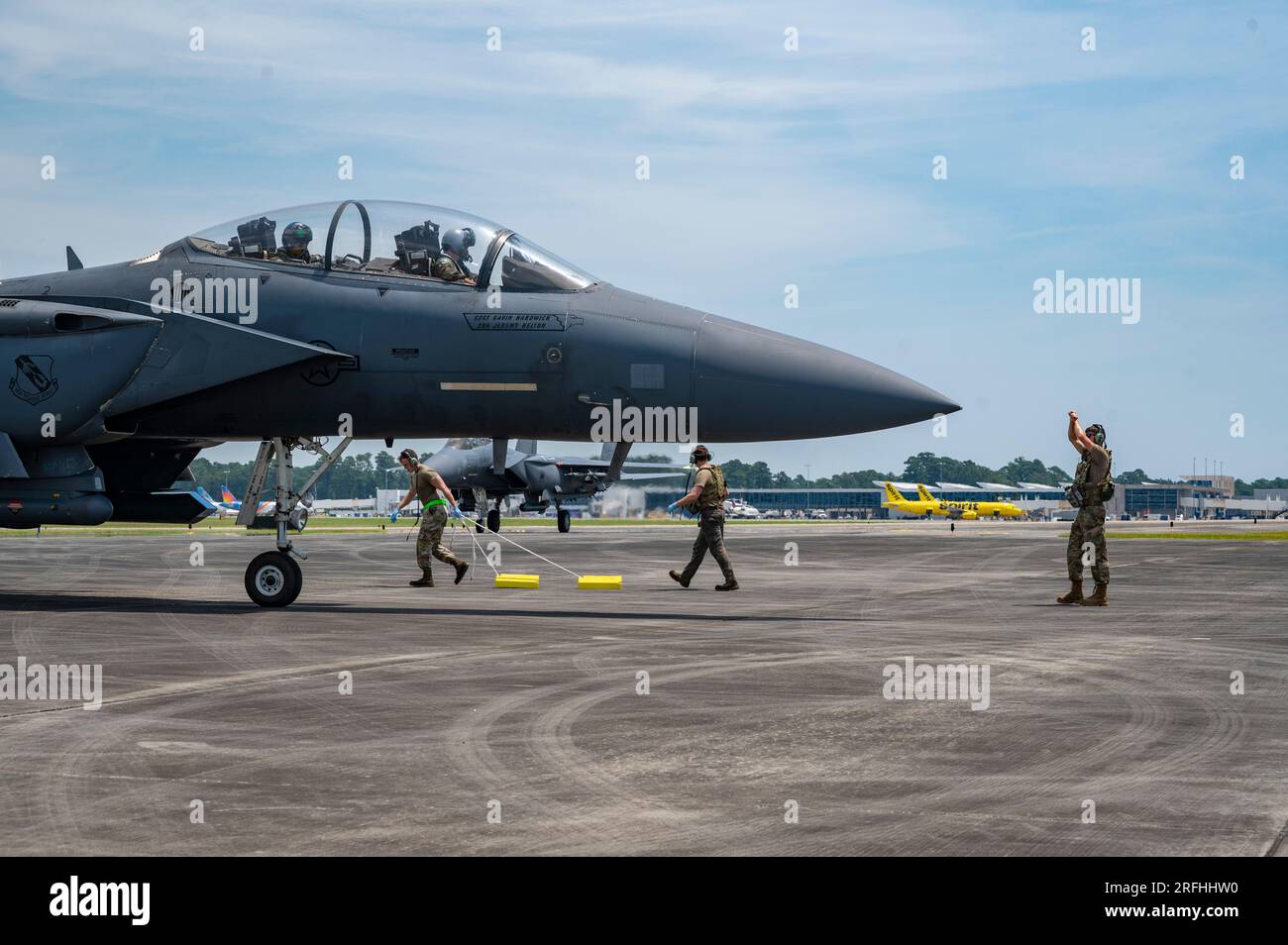 U.S. Air Force Airmen assigned to the 4th Fighter Wing prepare a F-15E ...