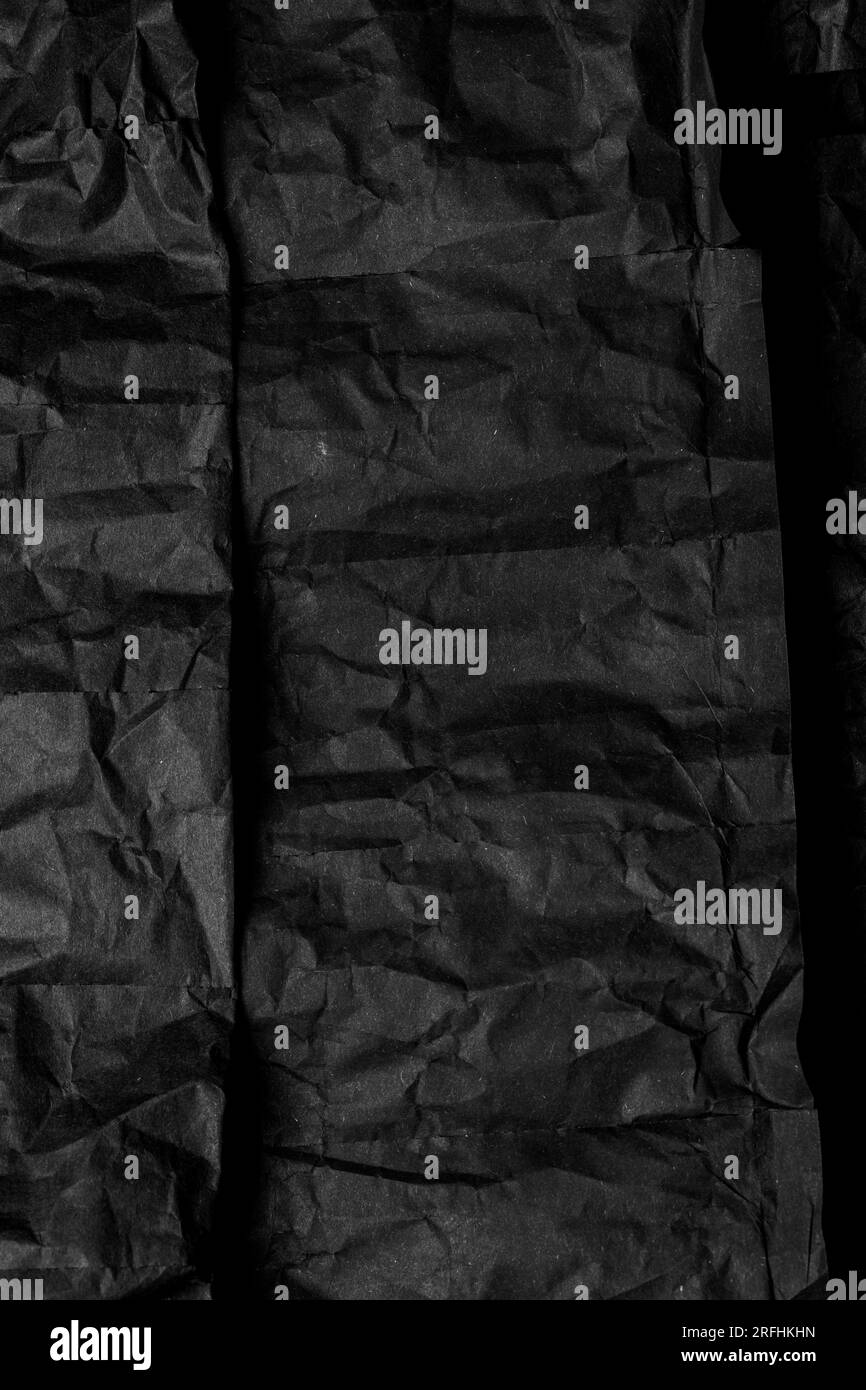 Texture of black crumpled paper. Dark paper background with chaotic ...