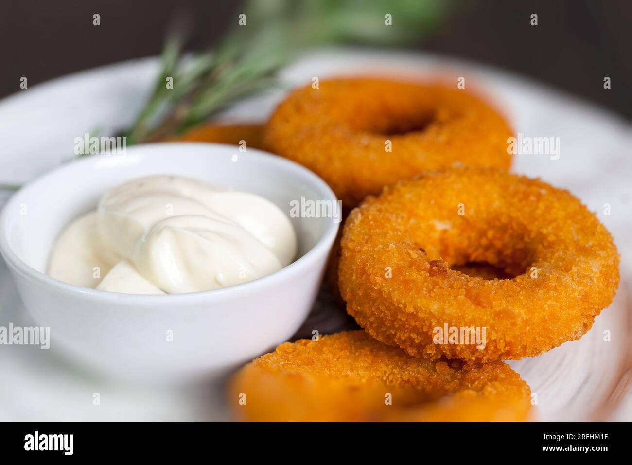 cheese rings with cheese sauce with spices, deep fried cheese rings in ...