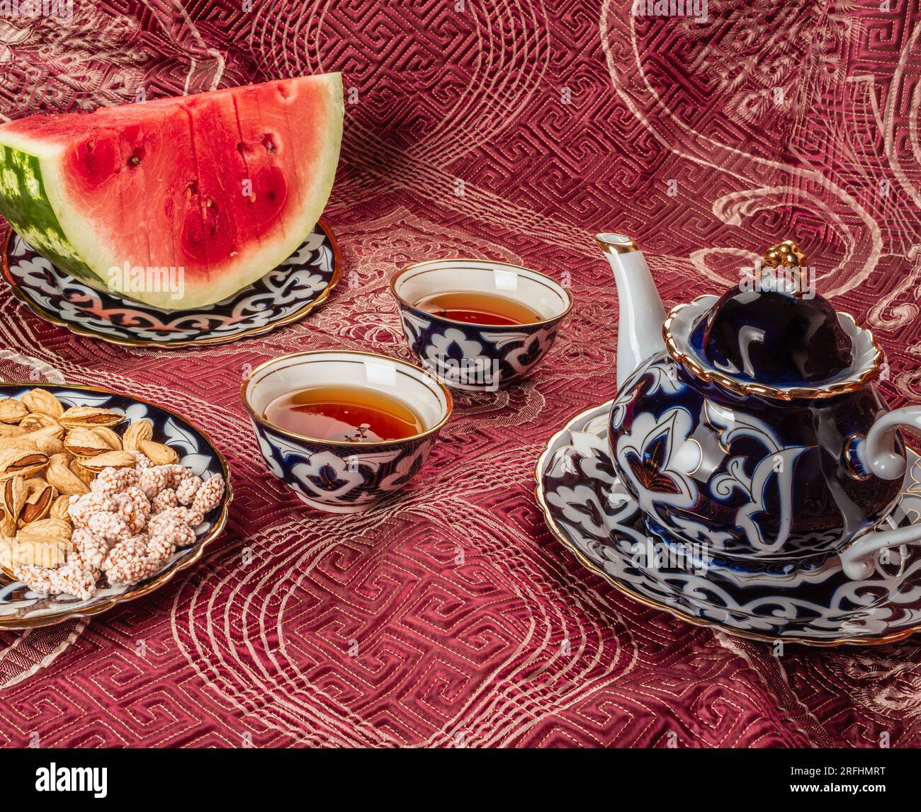 traditional uzbek tea with nuts and watermelon Stock Photo - Alamy