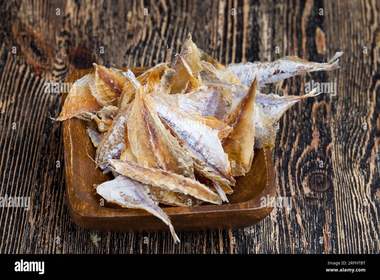 group of small fish gutted and dried with salt, dried and butchered ...