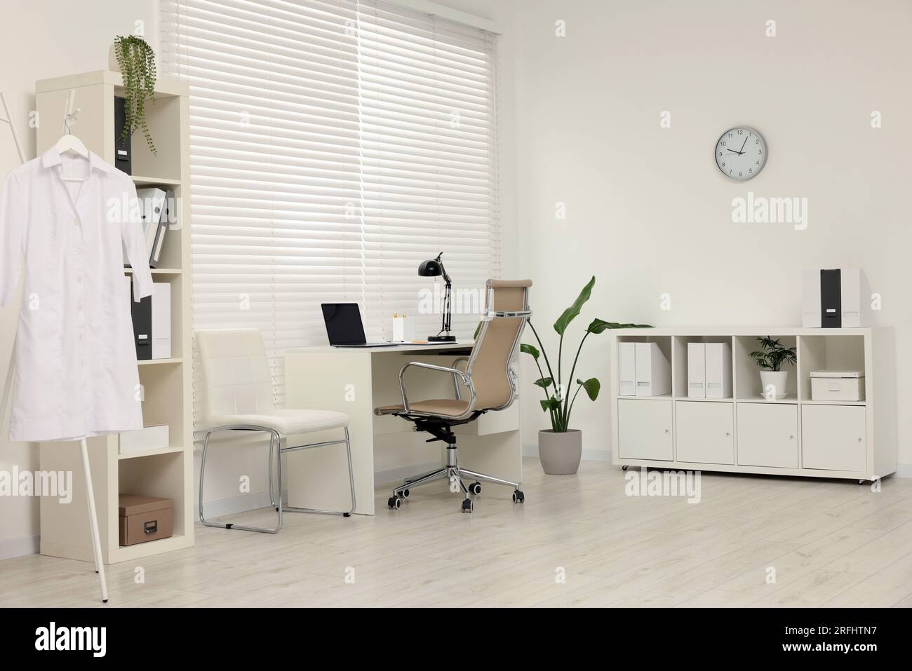Modern medical office with doctor's workplace in clinic Stock Photo - Alamy