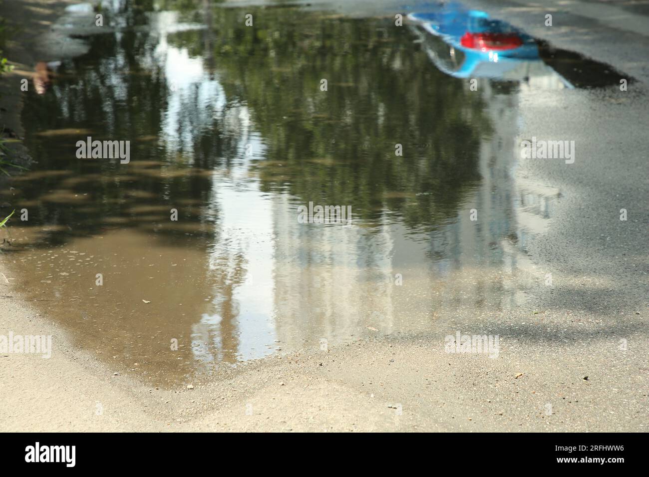 Sunny rain puddle hi-res stock photography and images - Alamy