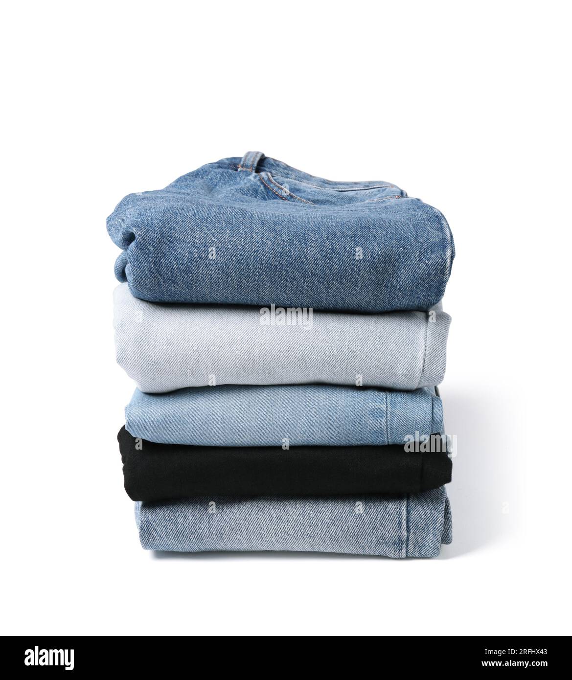 Stack of different folded jeans isolated on white Stock Photo - Alamy