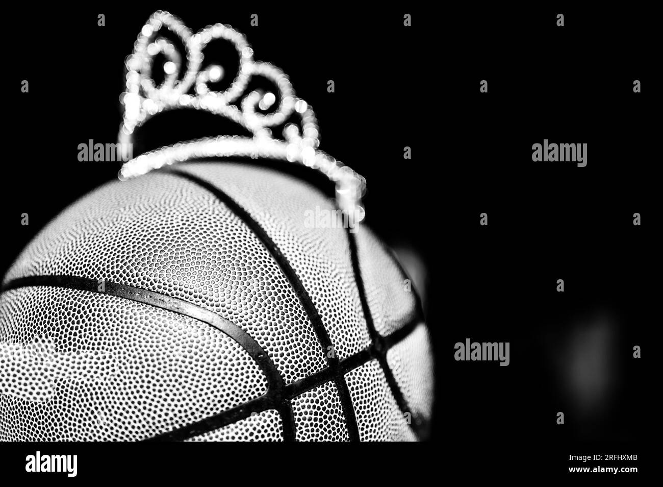 Basketball, tiara, and blank bracket signifying a Cinderella season ...