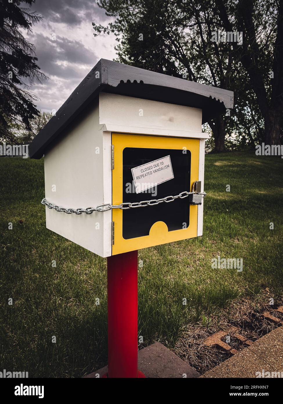 Little free library closed and locked due to vandalism Stock Photo - Alamy