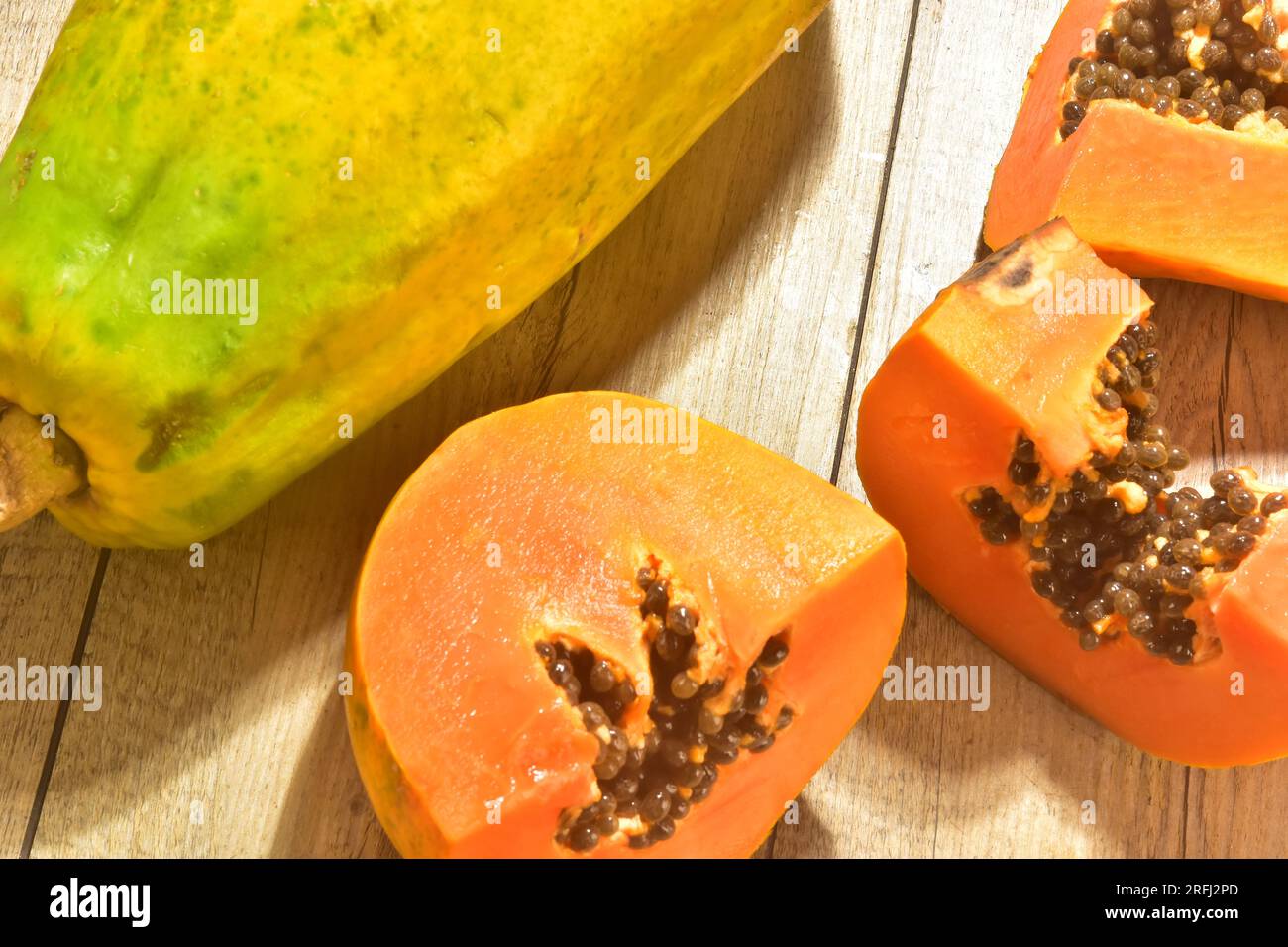 Eating papaya hi-res stock photography and images - Alamy