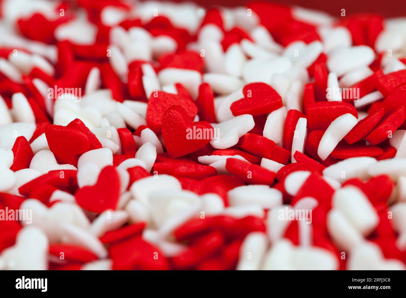 red and white sweet heart shaped candies for decorating desserts and ...