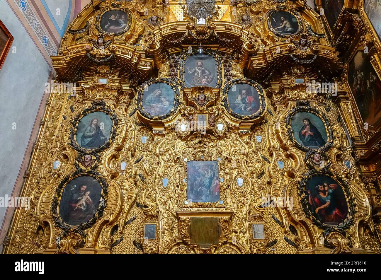 The 400-year-old gold altarpiece inside the baroque style Temple of San Francisco Mexican in the ...