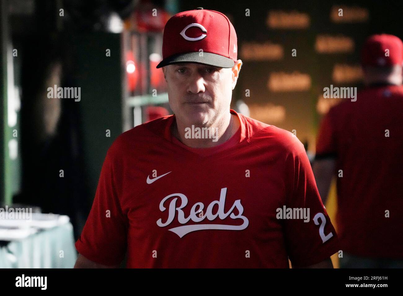 Cincinnati Reds manager David Bell walks in the dugout after being ...