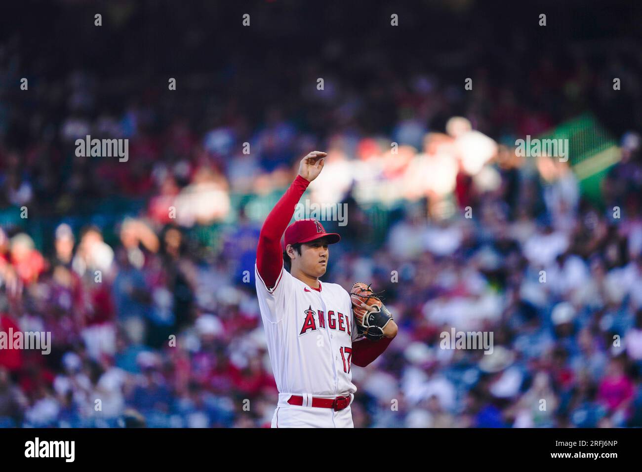 Los Angeles Angels starting pitcher Shohei Ohtani reacts after throwing ...