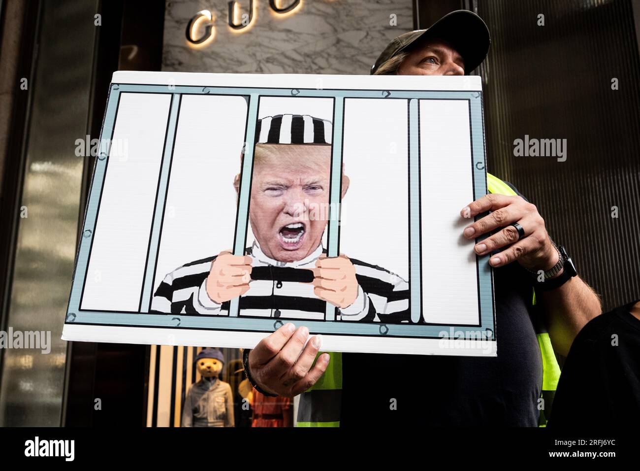 New York, United States. 03rd Aug, 2023. A person holds a sign showing ...