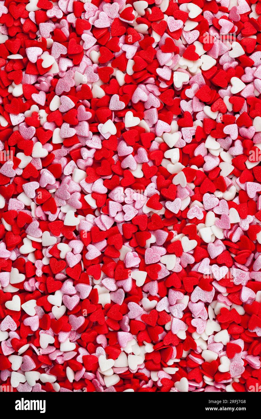 red and white sweet heart shaped candies for decorating desserts and ...