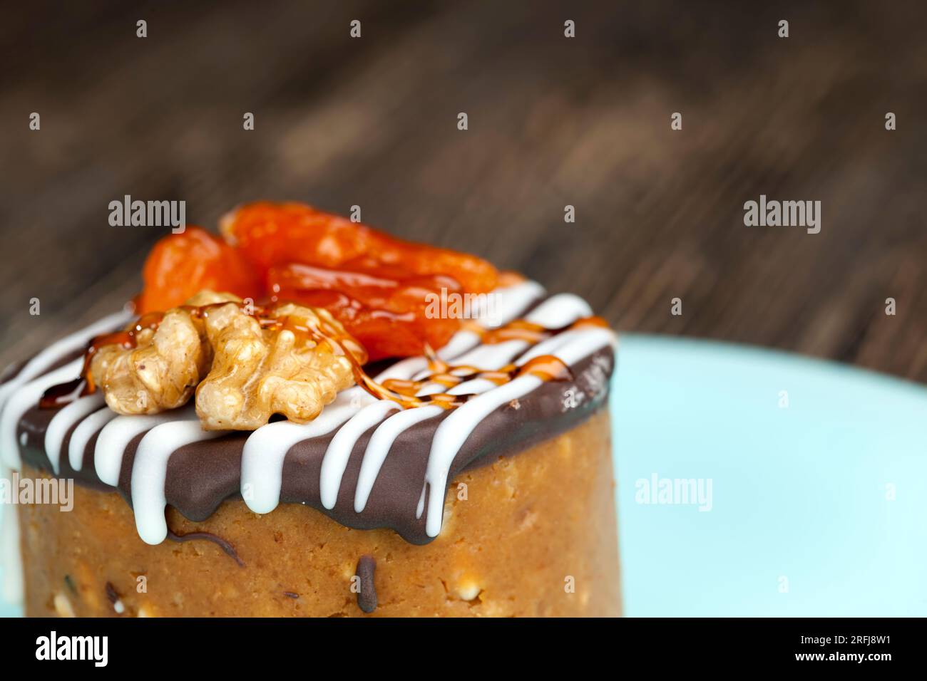 sweet cake in the shape of a cylinder, made of peanuts, sugar and dairy ...